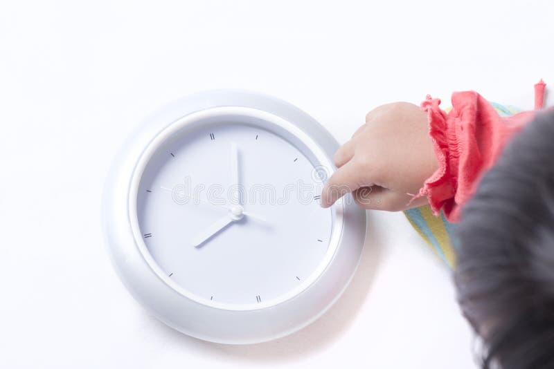 Kid`s Fingers Pointing Towards the Digital Clock. Stock Image - Image ...