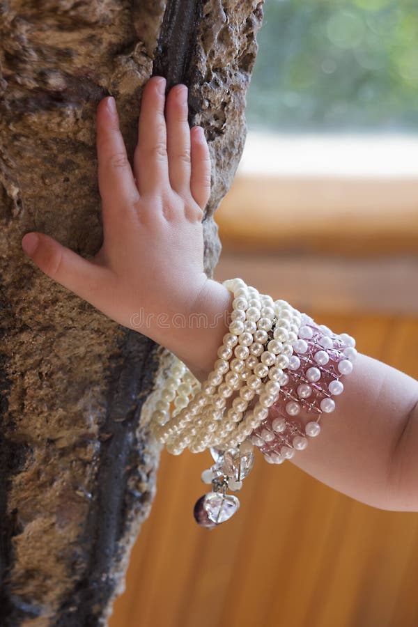 Kid S Hand with Pearl Bracelets Stock Image - Image of beauty, children ...