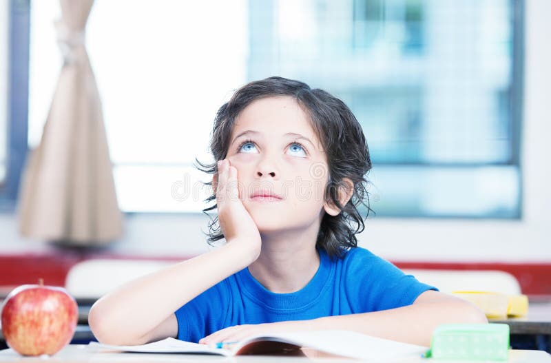 Kid at School Desk Thinking Looking Upward Stock Photo - Image of ...