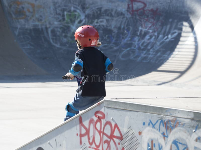 Kid with a scooter editorial photo. Image of roller, playground - 93009996