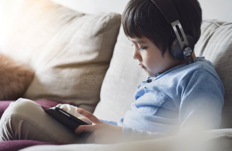 Kid Self Isolation Using Tablet for His Homework,Child Doing Using ...