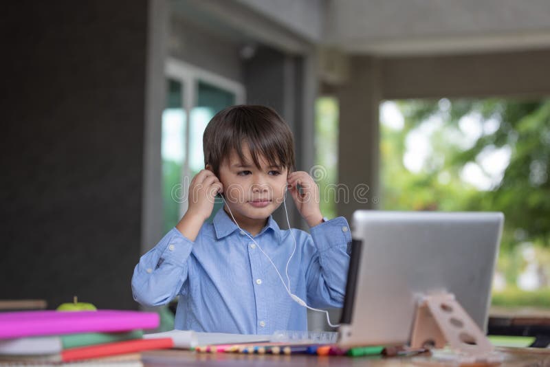 Kid Self Isolation Using Tablet for His Homework,Child Doing Using ...