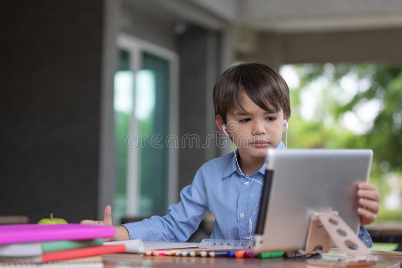 Kid Self Isolation Using Tablet for His Homework,Child Doing Using ...