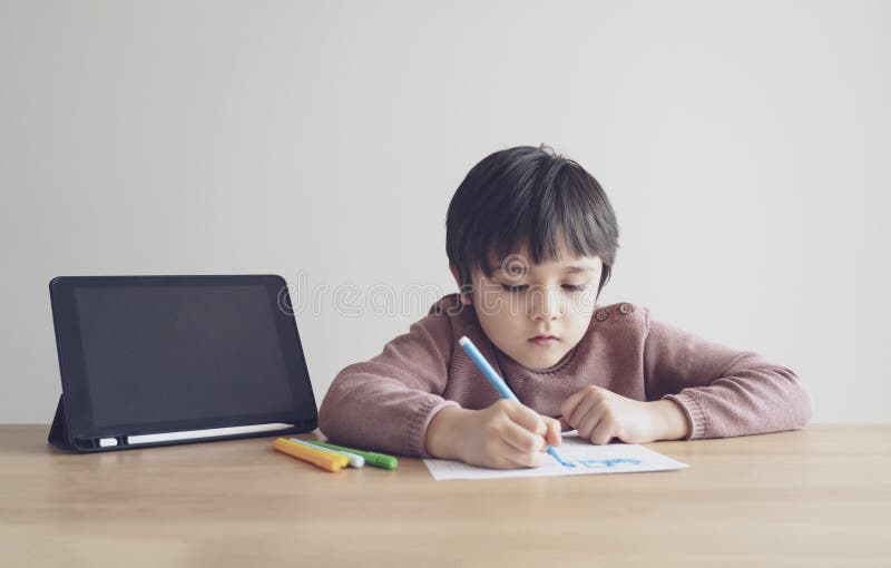 Kid Self Isolation Using Tablet for His Homework,Child Doing Using ...