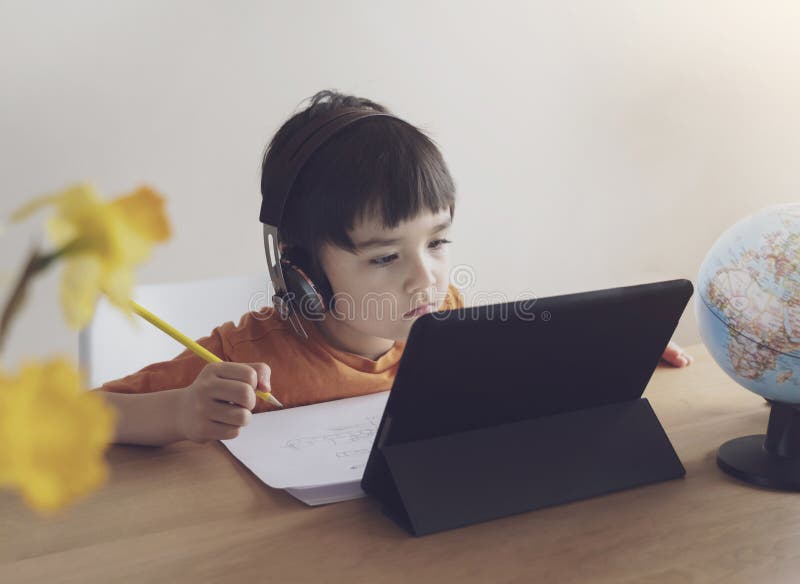 Kid Self Isolation Using Tablet for His Homework,Child Doing Using ...