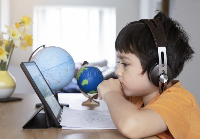 Kid Self Isolation Using Tablet for His Homework, Child Doing Using ...