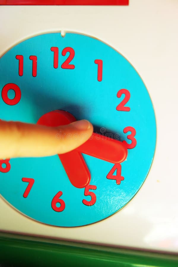 Clock Toy. Child Clock Toy. Stock Photo - Image of concept, hand: 100749284