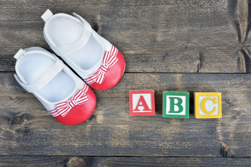 Kid shoes and word ABC stock photo. Image of learn, small - 75087054