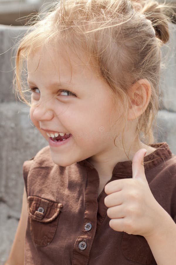 Kid showing ok stock image. Image of thumbsup, face, smiling - 24770297