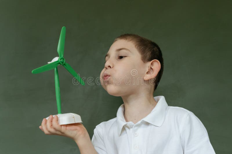 Kid Shows and Explains about Wind Generator Model at School Stock Photo ...