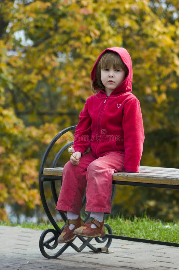 Kid Sitting on Bench Outdoors Stock Image - Image of nature, bench: 3509635