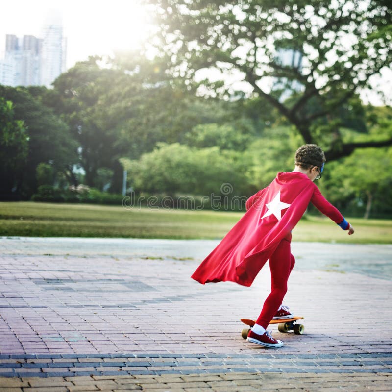 Kid Skateboard Superhero Youth Playful Concept Stock Photo - Image of ...