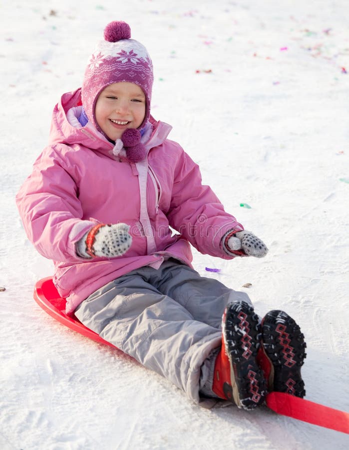 Kid on sled stock photo. Image of activity, nature, happiness - 33274384