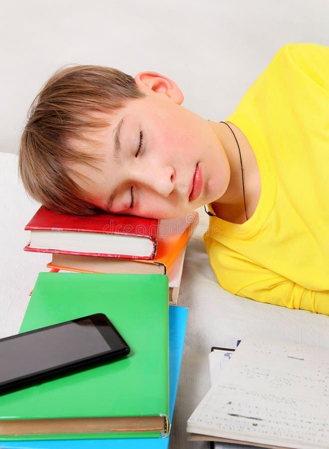 Kid sleep on the Books stock photo. Image of fatigue - 65312760