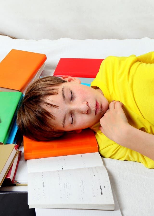Kid sleep on the Books stock image. Image of exam, lassitude - 74099289