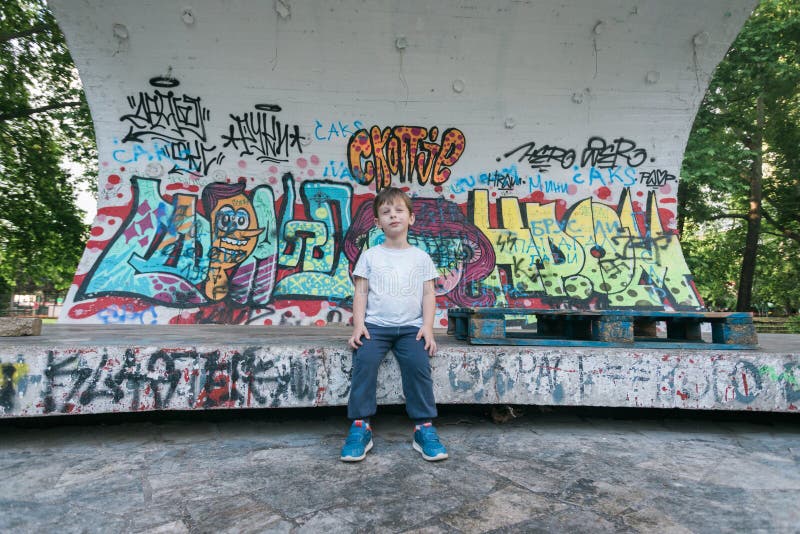 Kid Smiling on Stage Portrait with Graffiti Editorial Photo - Image of ...