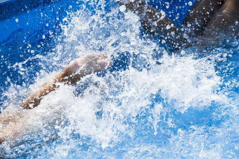 Kid splashing in the pool stock image. Image of happy - 43528467