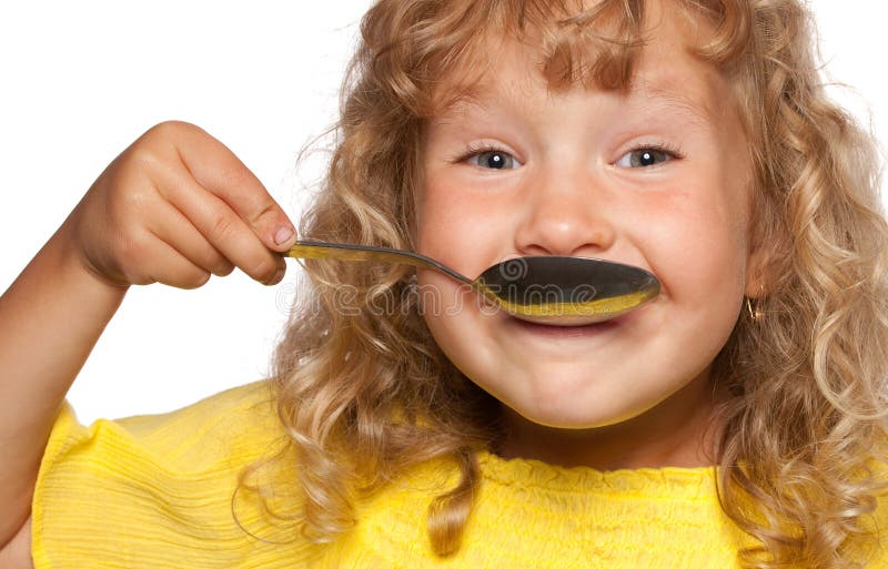 Child with spoon stock photo. Image of eating, smiling - 31600736