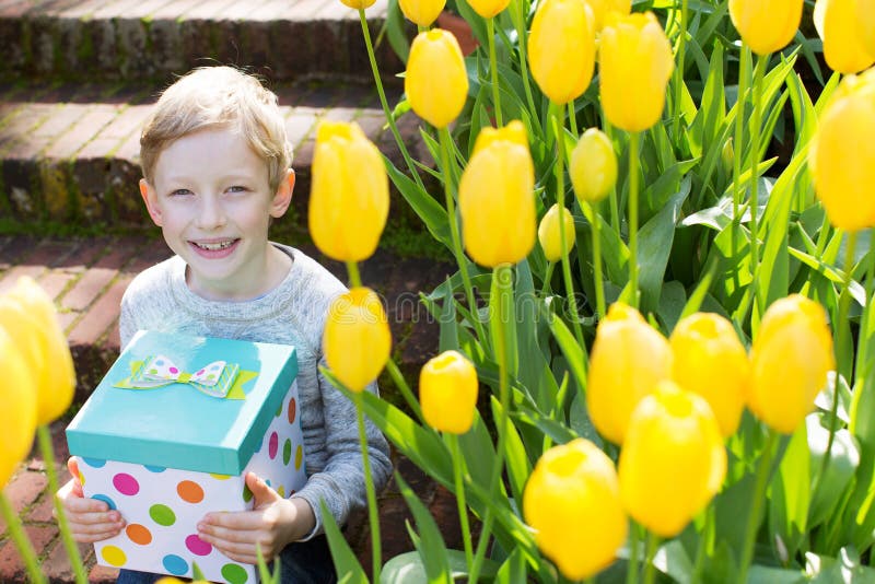 Kid at spring stock image. Image of family, holiday, flowers - 70413145