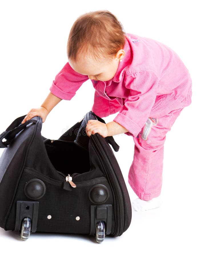 Kid stepping into bag stock photo. Image of pink, black - 9256164