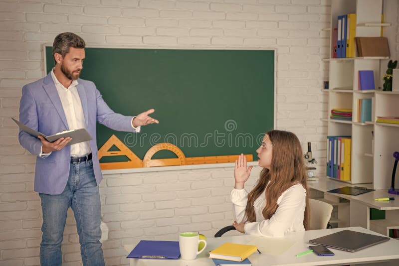Kid Study in Classroom with Teacher. Selective Focus Stock Image ...