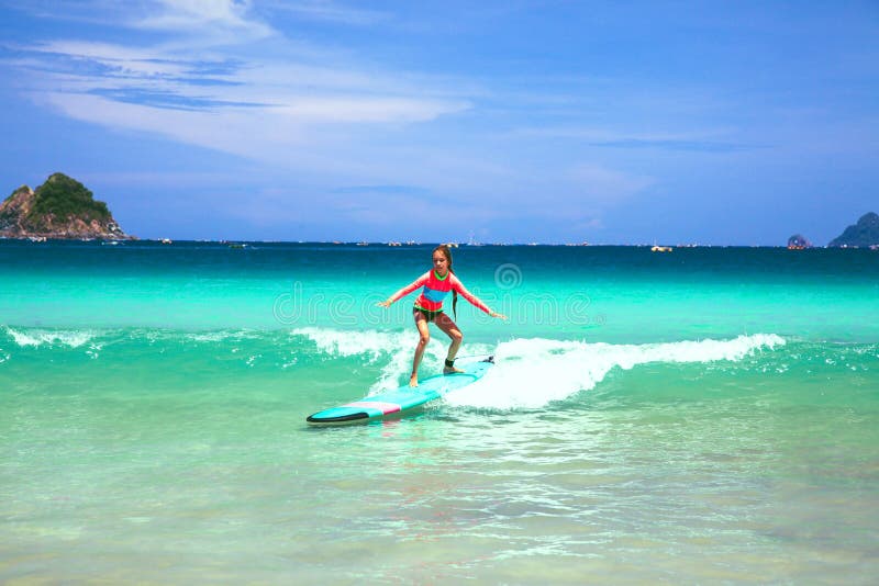 Kid surfing stock image. Image of surfer, riding, camp - 70114215