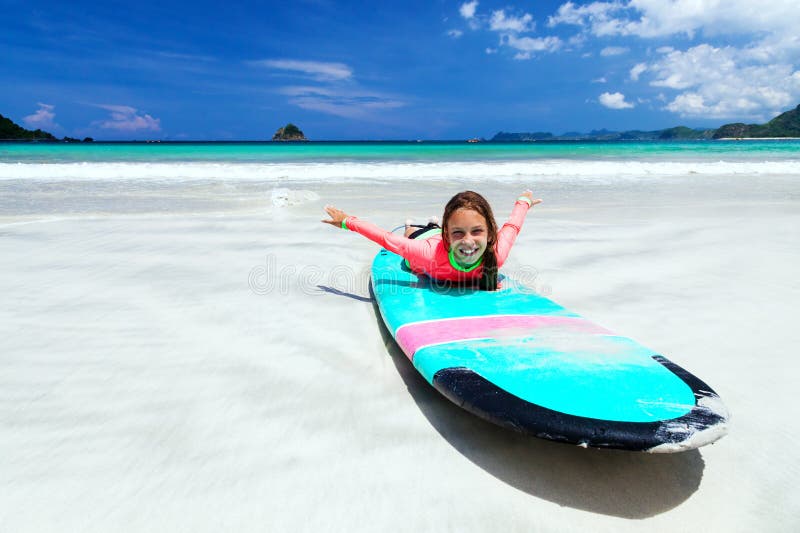 Kid surfing stock image. Image of leisure, riding, holiday - 70114515