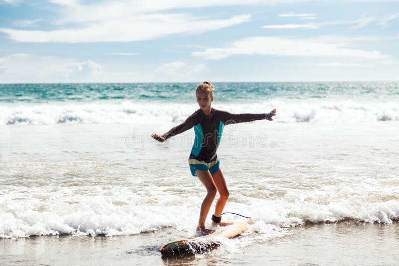 Kid surfing stock photo. Image of surfer, coast, ocean - 70114782
