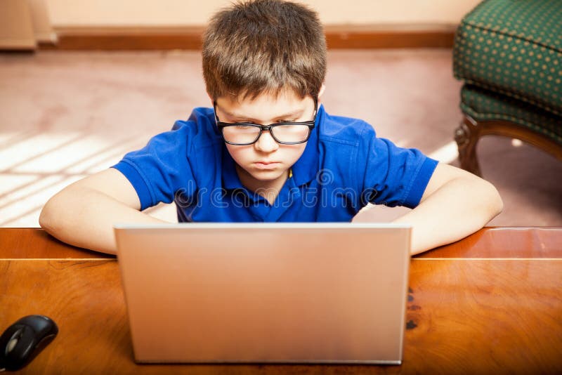 Kid Surfing the Web on a Laptop Stock Photo - Image of internet, male ...