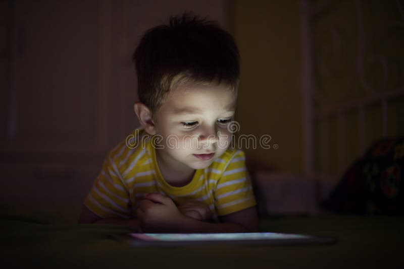 Kid with Tablet in the Dark Stock Image - Image of dark, game: 42338847