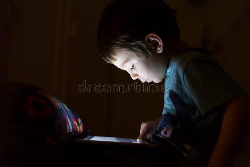 Kid with Tablet in the Dark Stock Image - Image of person, digital ...