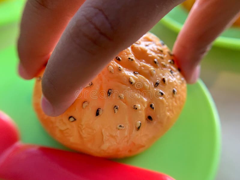 A Kid Takes Plastic Bread Toys. Stock Image - Image of fresh, close ...