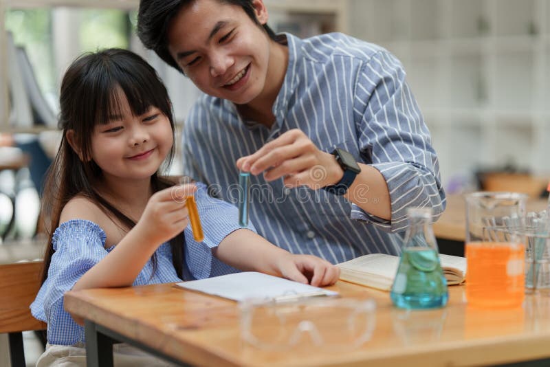 Kid and Teacher Doing Science Experiments. Back To School Concept Stock ...