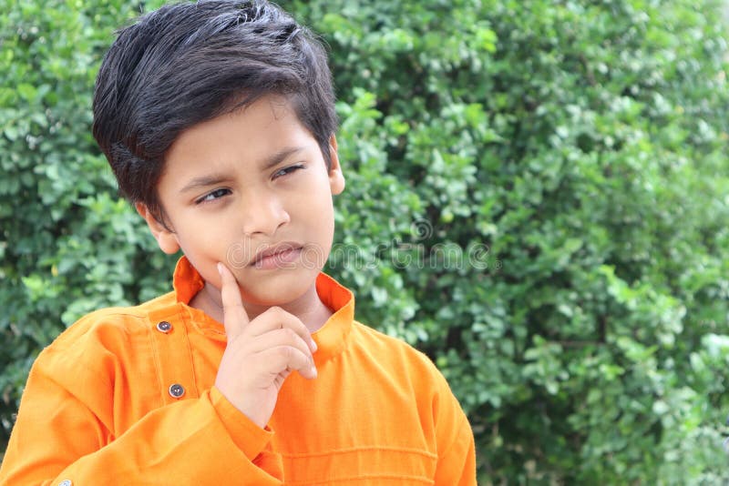 A Kid with a Expression - Thinking Stock Photo - Image of play, male ...