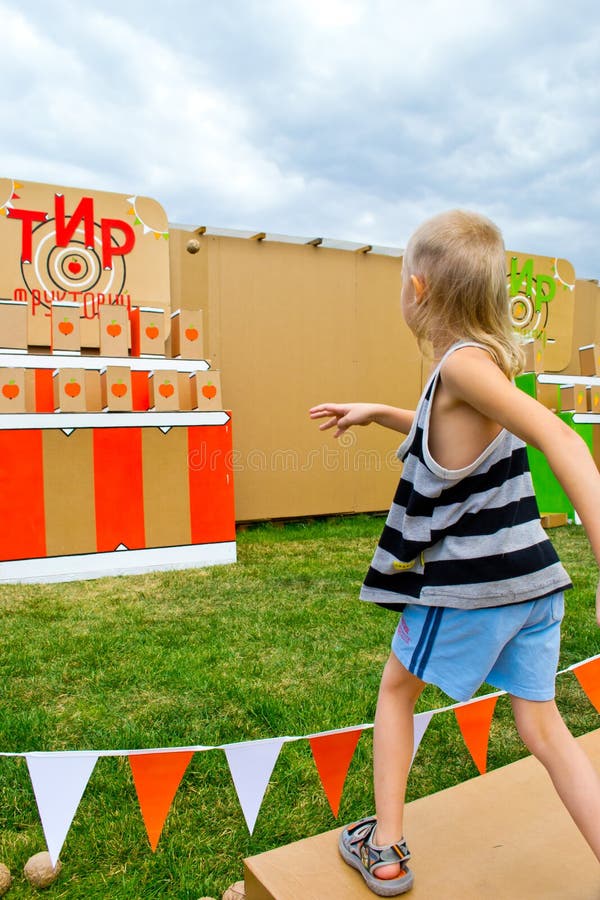 Kid Throwing Balls at a Target Stock Image - Image of beautiful, baby ...