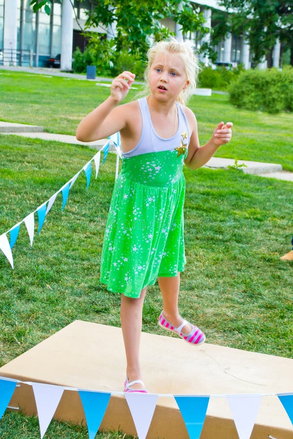Kid Throwing Balls at a Target Stock Image - Image of active, ball ...