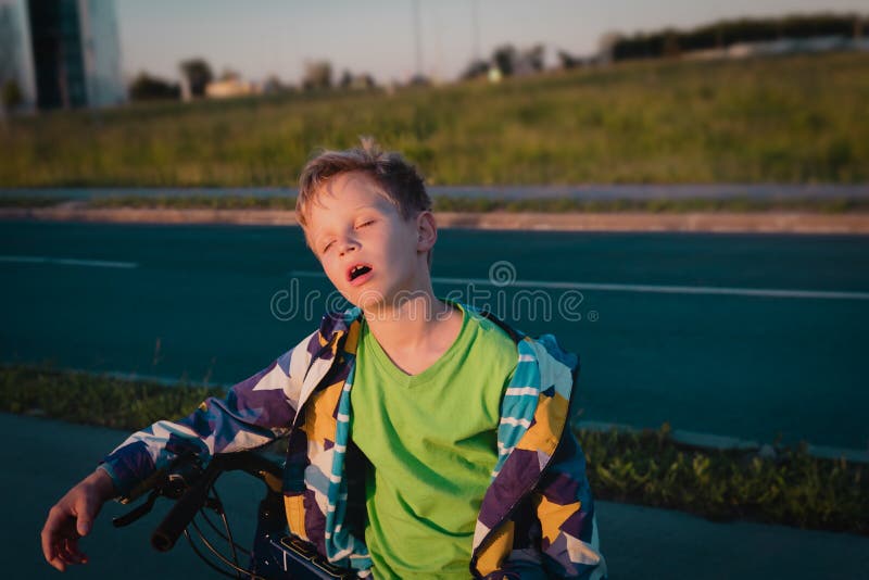 Kid Tired of Bike Riding, Boy Exhausted by Exercise Stock Image - Image ...