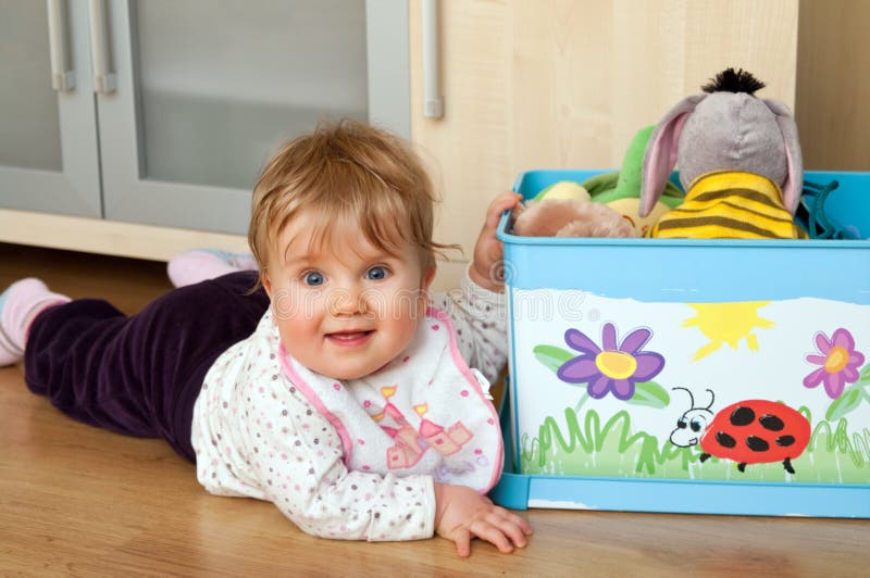 Kid with toy box stock image. Image of plays, playful - 17853475