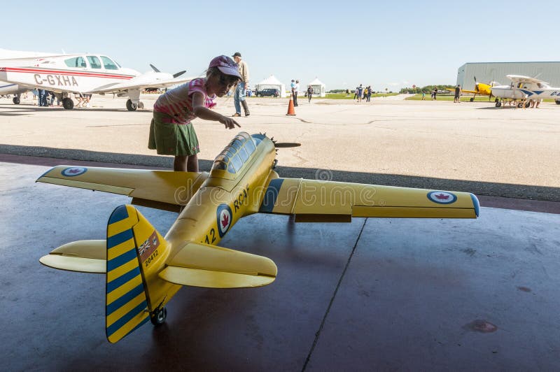 Kid and toy plane editorial stock image. Image of airplane - 45299164