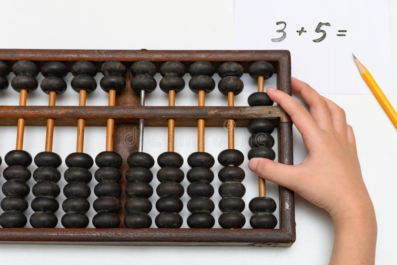 A Kid Using Abacus To Calculate Simple Addition Equation Stock Image ...