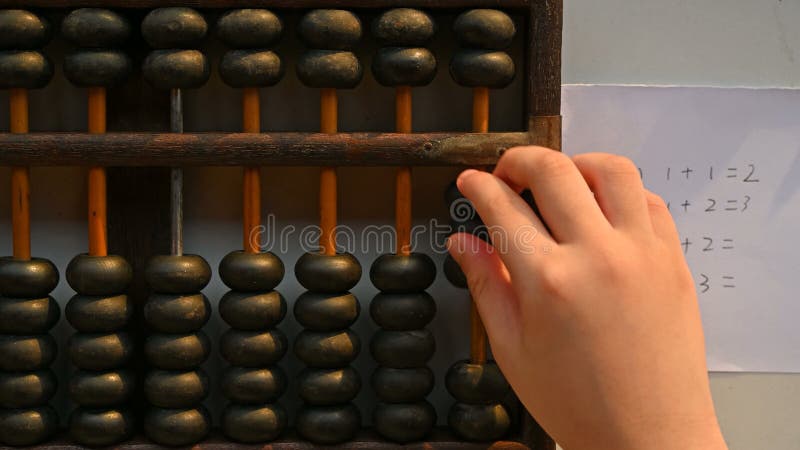 Kid Using Abacus To Calculate Simple Addition Equations Stock Video ...