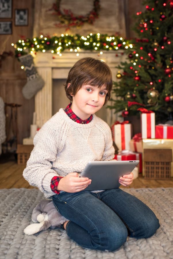 Kid using digital tablet stock image. Image of background - 89640199