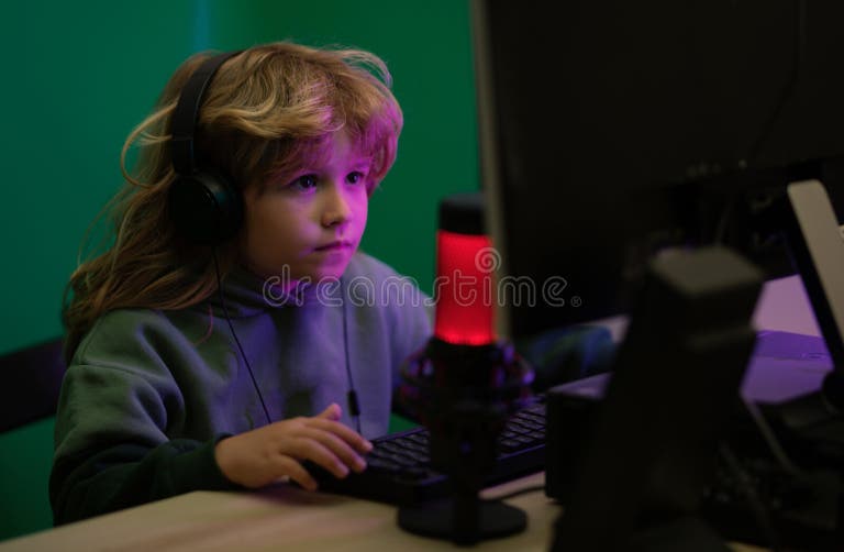 Kid Using Pc at Night. Child with Computer in a Dark Room Stock Photo ...