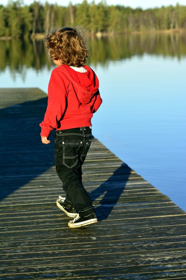 Kid walking on the bridge stock image. Image of child - 35377277