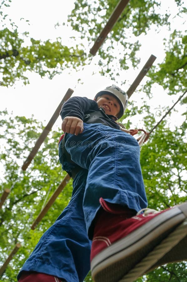 Kid Walking on a Wire in Adventure Park Stock Image - Image of ...