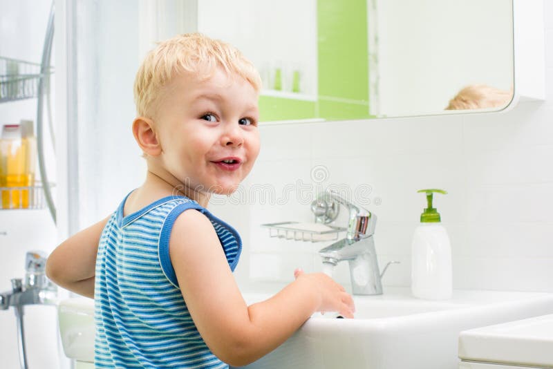 Kid Washing His Face and Hands in Bathroom Stock Image - Image of ...