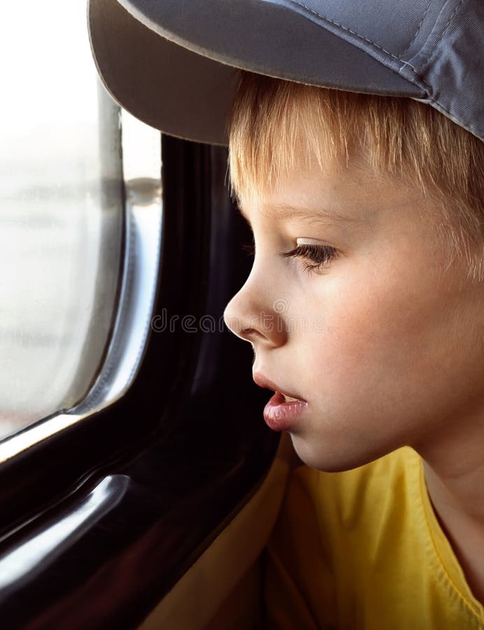 Kid in the Train closeup stock image. Image of passenger - 320186155