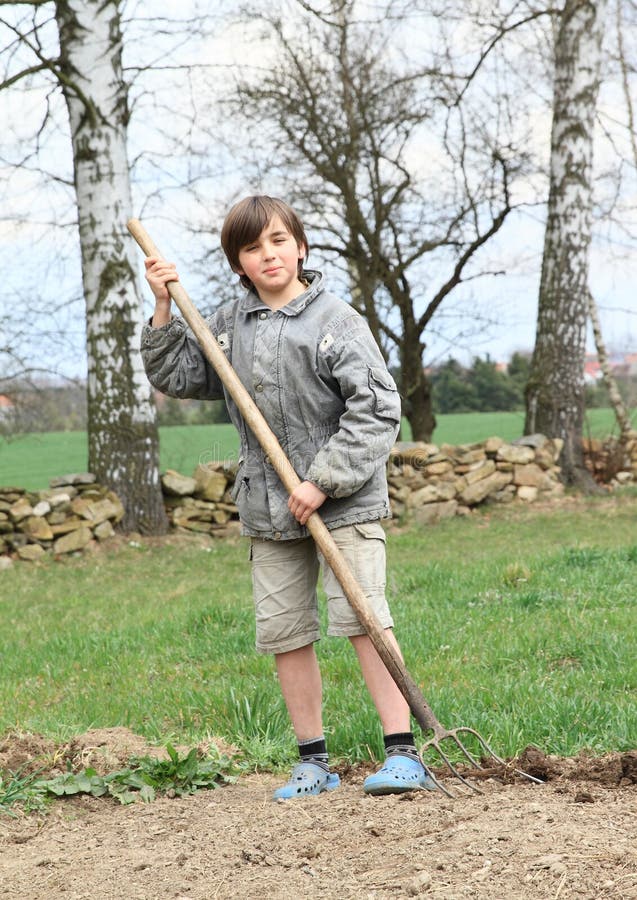 Kid working on the field stock photo. Image of nuzzle - 52851630