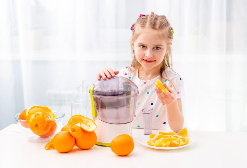 Kid working with oranges stock photo. Image of happy - 149421760