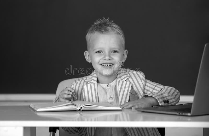 Cute Little Preschool Kid Boy Study in a Classroom. Little Ready To ...